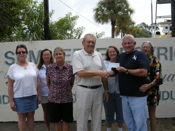 Local civic association donates check to Semmer Electric Fourth of July ...